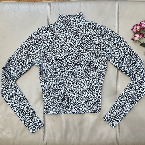 Brandy Melville | Tops | Brandy Melville Cheetah Print Turtle Neck Top ...